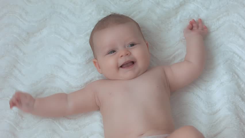 cute little baby looking into camera Stock Footage Video (100% Royalty ...