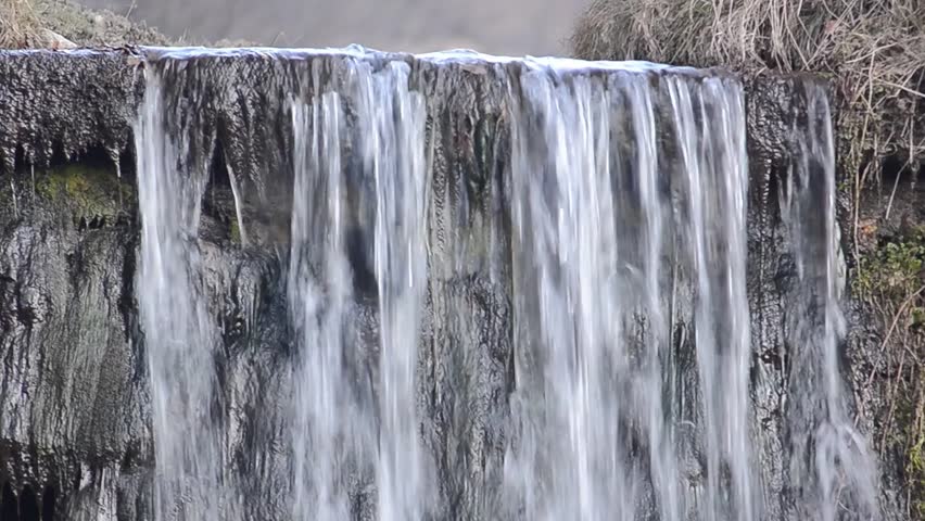 torrent water falling over stone wall Stock Footage Video (100% Royalty ...