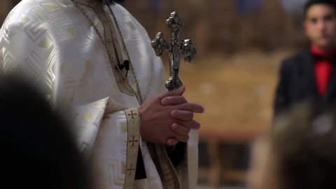 priest holds cross his hands while Stock Footage Video (100% Royalty ...