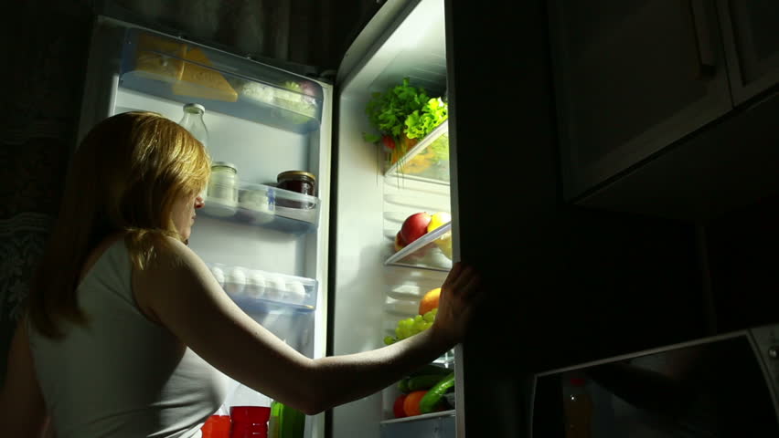 woman opens refrigerator night hunger diet Stock Footage Video (100% ...