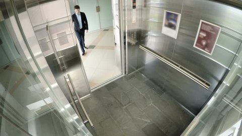 Businessmen Riding Elevator Stock Footage Video (100% Royalty-free ...