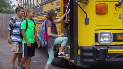 Students Get Onto School Bus Stock Footage Video (100% Royalty-free ...