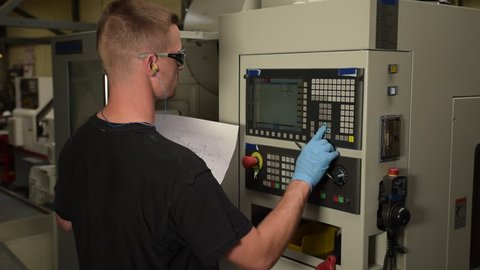 Industrial Worker Operating Cnc Turning Machine Stock Photo 635192780 ...