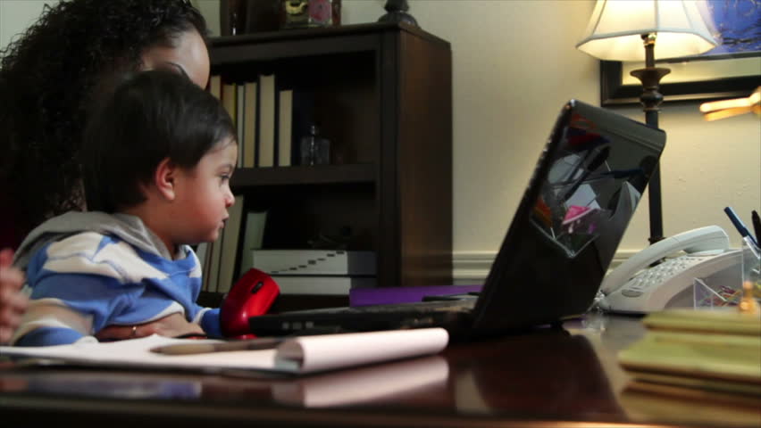 A Pretty Hispanic Mom Working Stock Footage Video (100% Royalty-free ...