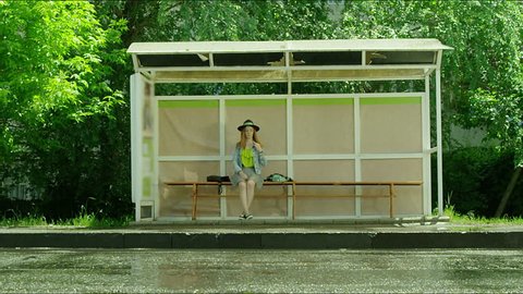 Girl Sitting Alone Bus Stop Shot Stock Footage Video (100% Royalty-free ...