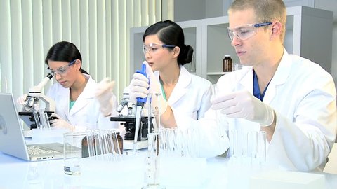 4k scientists working lab looking into Stock Footage Video (100% ...