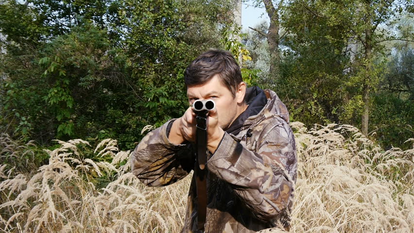 Hunter Hiding in the Grass Stock Footage Video (100% Royalty-free ...