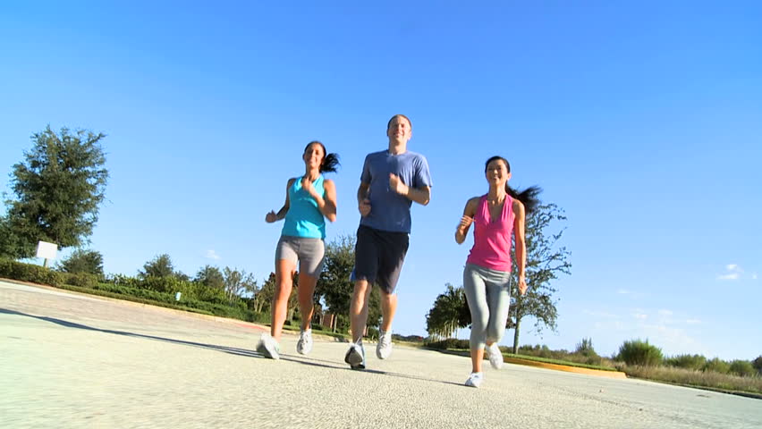 group young people jogging on suburban Stock Footage Video (100% ...