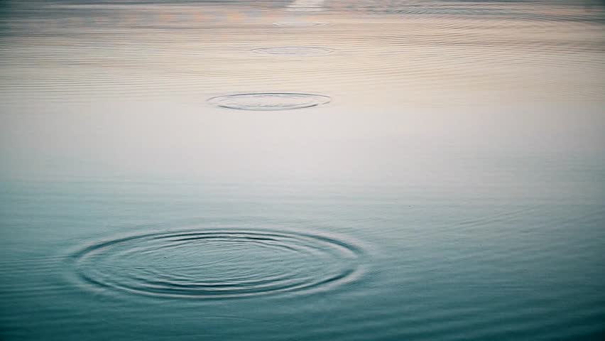 stone skipping on water surface throwing Stock Footage Video (100% ...