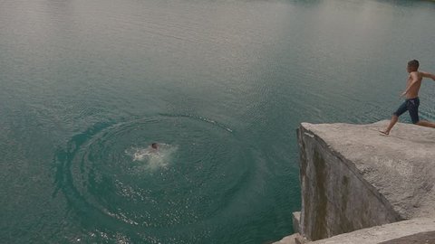 Teenager Boy Jumping Off Cliff His Stock Footage Video (100% Royalty ...