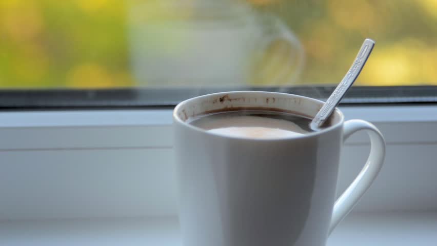 evaporation mug hot coffee spoon near Stock Footage Video (100% Royalty ...