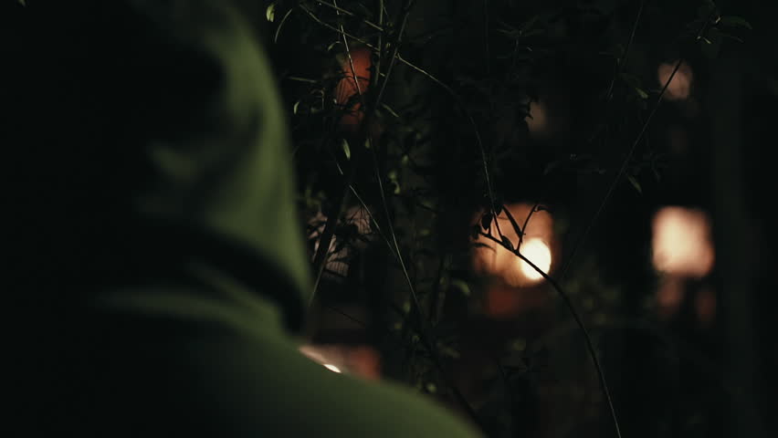 Hooded Stalker Stalking Apartment from Stock Footage Video (100% ...