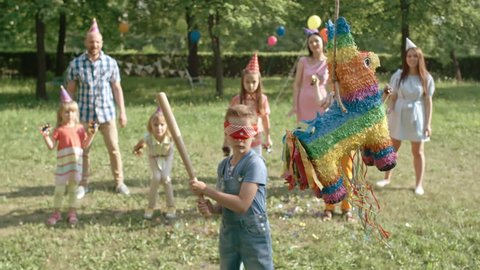 Slow Motion Shot Boy Hitting Pinata Stock Footage Video (100% Royalty ...