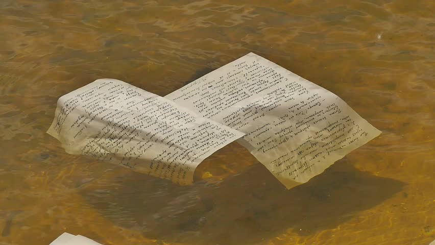 hand-written paper floats on water manuscript Stock Footage Video (100% ...