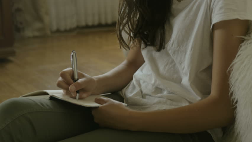 Thoughtful Girl Writing a Diary. Stock Footage Video (100% Royalty-free ...