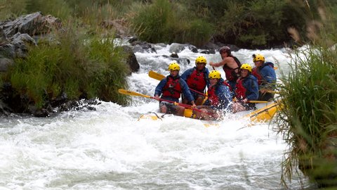 whitewater rafting team descending raging rapids Stock Footage Video ...