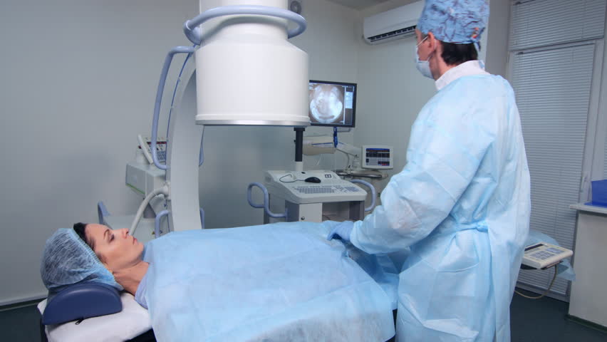 Interventional Radiologist Performs Endovascular Surgery Stock Footage ...