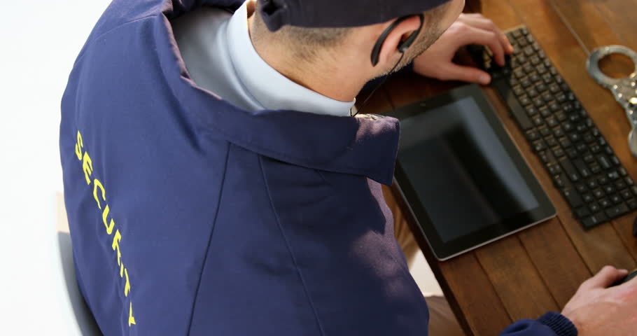Security Guard Working On Computer Stock Footage Video (100% Royalty ...
