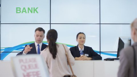 4k Bank Customers Queuing Talk Friendly Stock Footage Video (100% ...