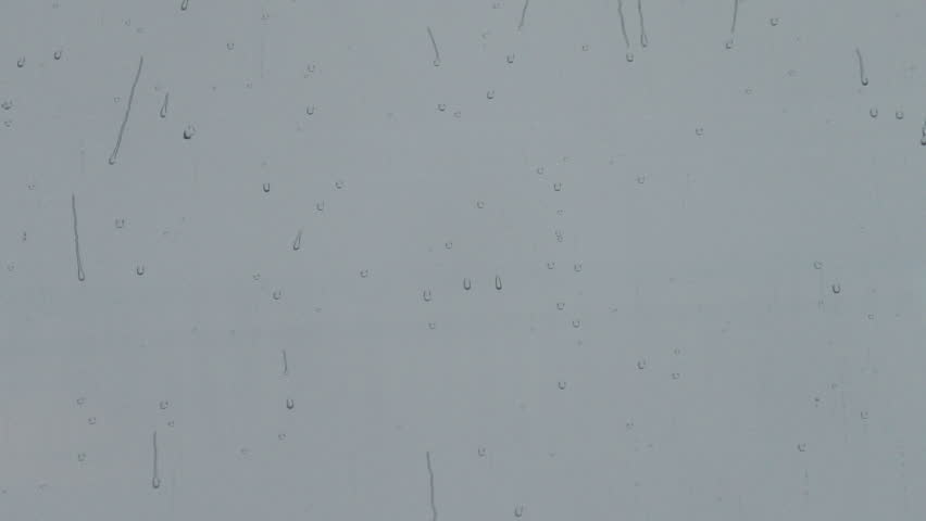 raindrops falling on window's glass flowing Stock Footage Video (100% ...