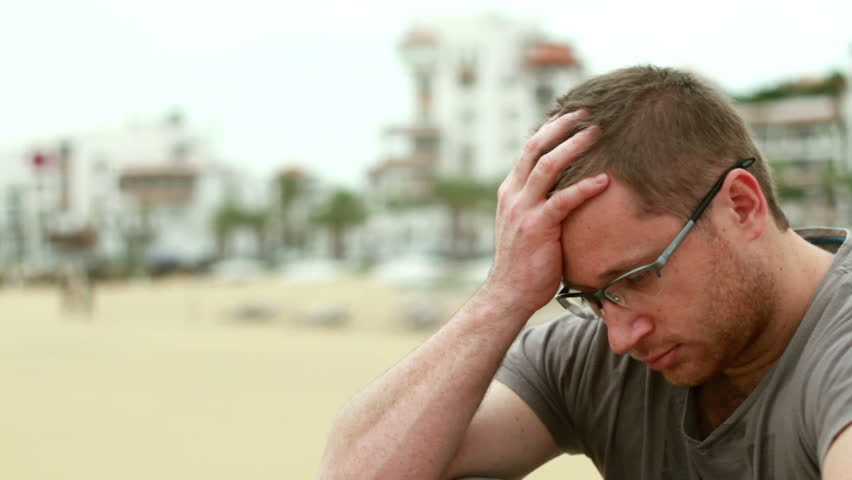 sad pensive man sitting by beach Stock Footage Video (100% Royalty-free ...