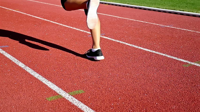 lean runner beginning race starting blocks Stock Footage Video (100% ...