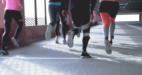 Group Runners Seen Behind Jogging Together Stock Footage Video (100% ...