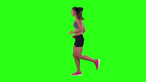 Woman Jogging Medium Frontal Shot Green Stock Footage Video (100% ...