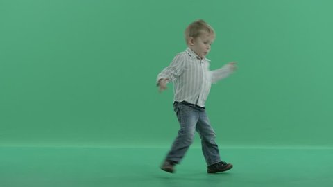 Little Boy Dancing Against Green Screen Stock Footage Video (100% ...