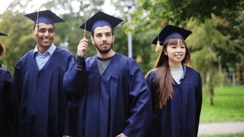 Three Young Graduates Standing Outdoors Graduate Stock Photo 34820965 ...