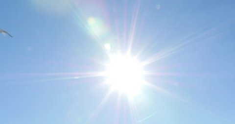 sun moving across clear blue sky Stock Footage Video (100% Royalty-free ...