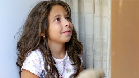 Cute Little Girl Sitting On Windowsill Stock Footage Video (100% ...