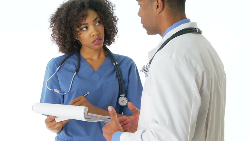 two african-american doctors talking reading clipboard Stock Footage ...