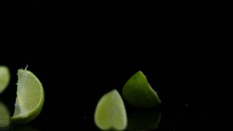 Lime Splits Into Segments On Black Stock Footage Video (100% Royalty ...
