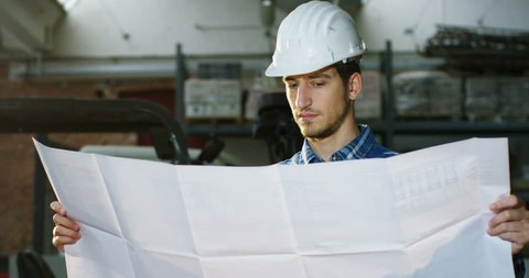 Builder Looks Plans Future Building House Stock Footage Video (100% ...