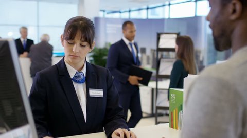 4k Worker Customer Service Desk Assisting Stock Footage Video (100% ...