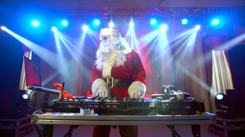 Dj Santa Claus Mixing Some Christmas Stock Footage Video (100% Royalty ...