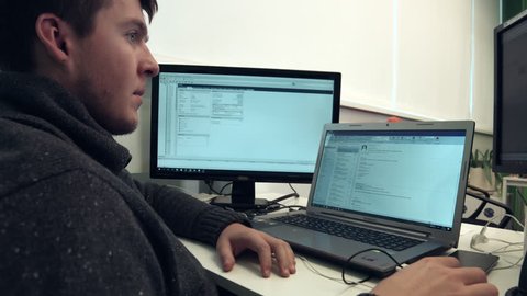 Male Programmer Coding On Desktop Computer Stock Photo 1150179992 ...