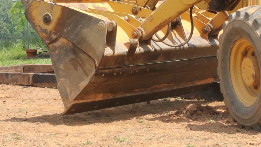 backhoe front bucket pushes cross-tie slight Stock Footage Video (100% ...