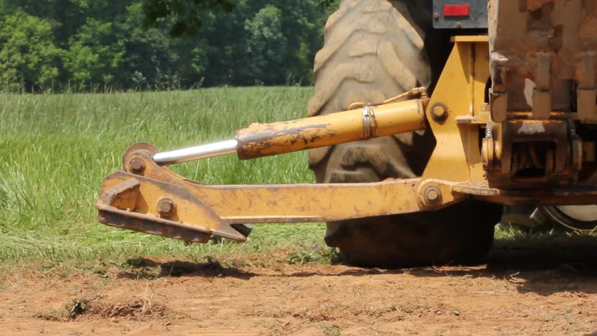 Backhoe Retracts Stabilizer Arm and Stock Footage Video (100% Royalty ...