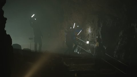 4k Team Geologists Exploring Underground Cave Stock Footage Video (100% ...