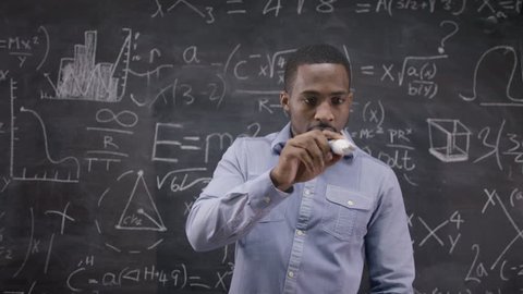 4k Academic Man Writing Math Formula Stock Footage Video (100% Royalty ...