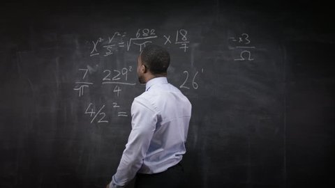 4k Young Smiling Teacher Writing Math Stock Footage Video (100% Royalty ...