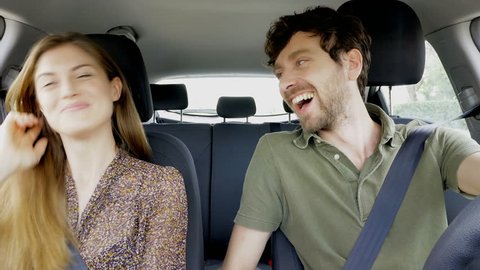 Happy Couple Laughing Cuddling Car Driving Stock Footage Video (100% ...