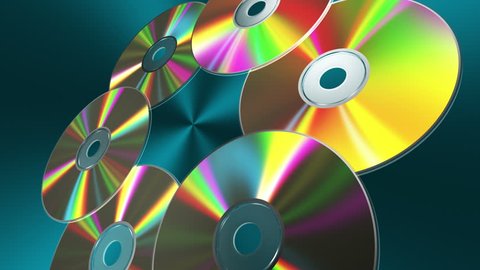 Rotating Cddvd Discs Over Blue Background Stock Footage Video (100% ...