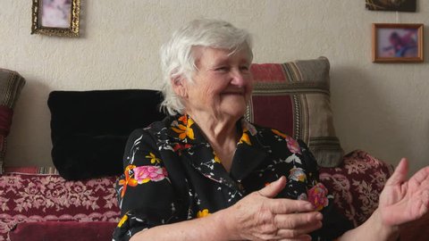 Grandmother Rocking Baby Her Arms Sitting Stock Footage Video (100% ...