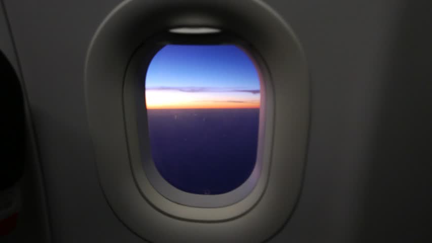 moving airplane window look outside during Stock Footage Video (100% ...