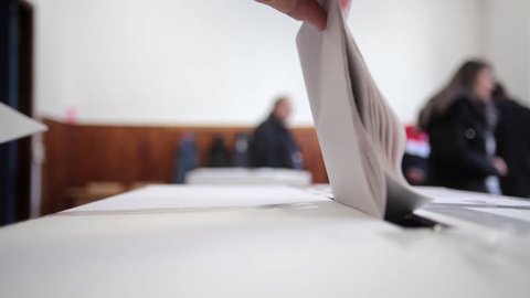 Person Casts Her Ballot During Voting Stock Footage Video (100% Royalty ...