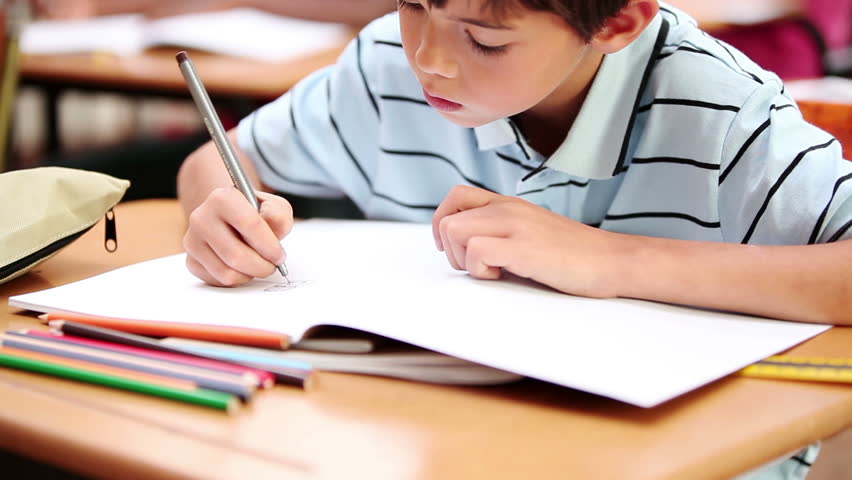 front view smiling caucasian boy writing Stock Footage Video (100% ...