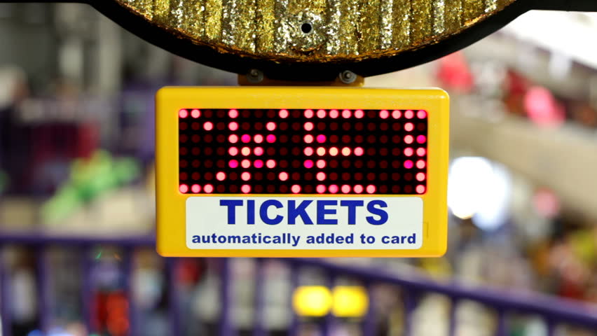 win tickets sign flashing on arcade Stock Footage Video (100% Royalty ...